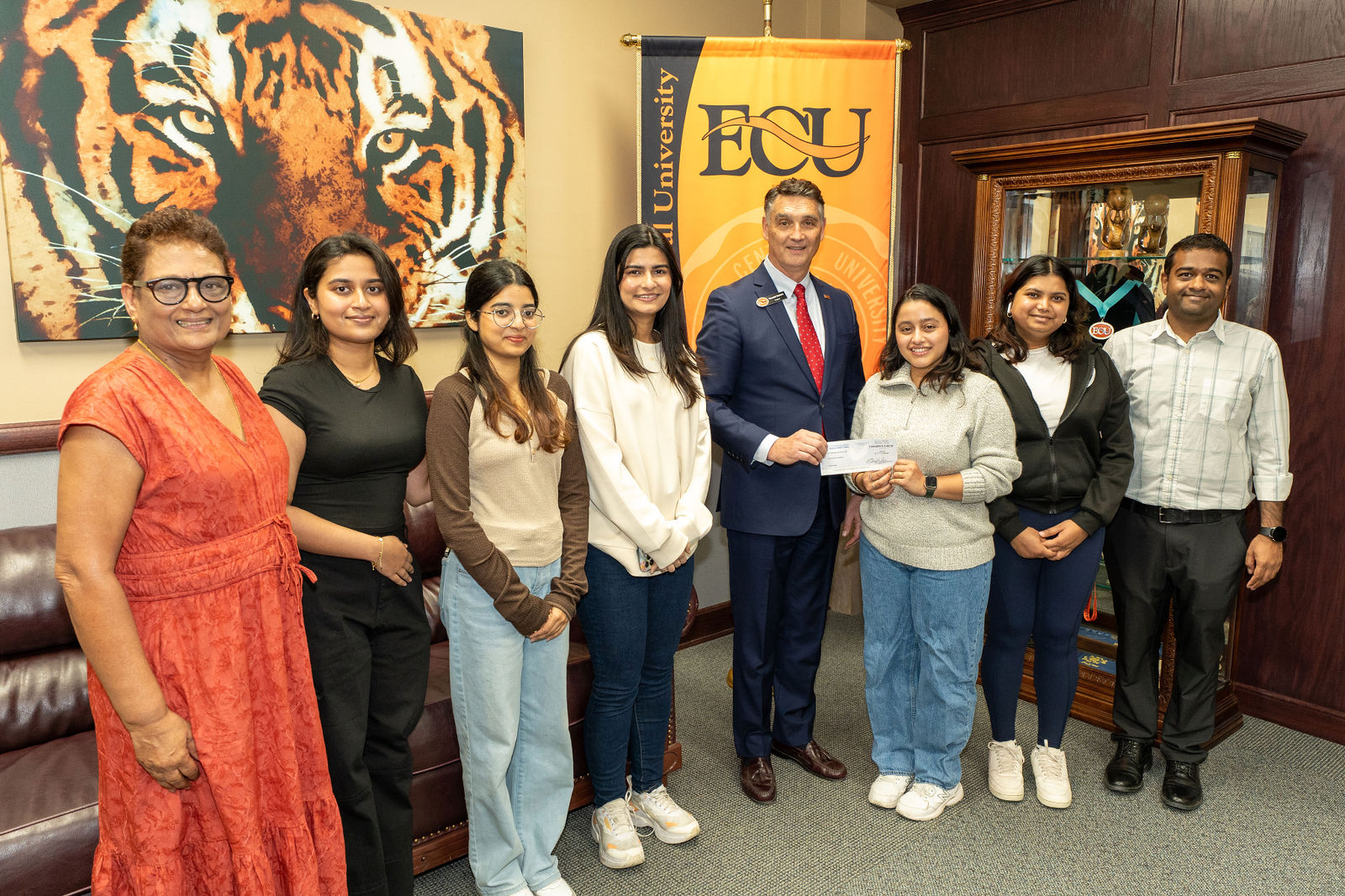Asian Student Association Presents Check to President Godwin by East ...