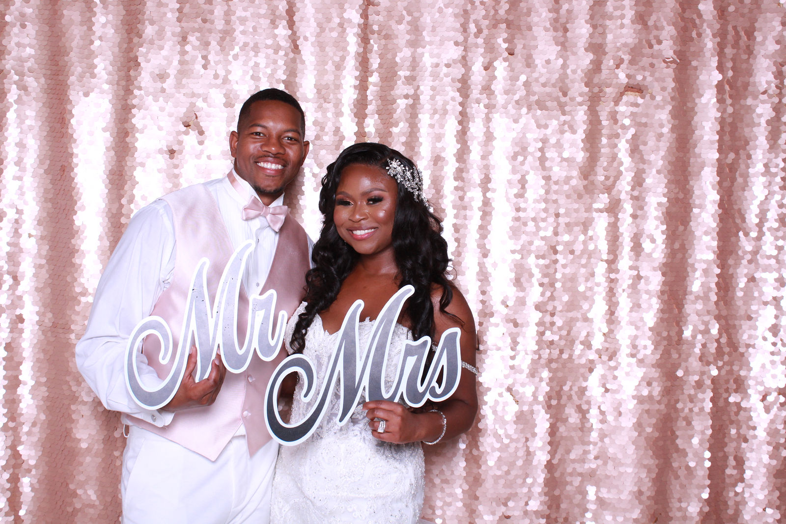 Mr. & Mrs. Gill by The Booth Co.